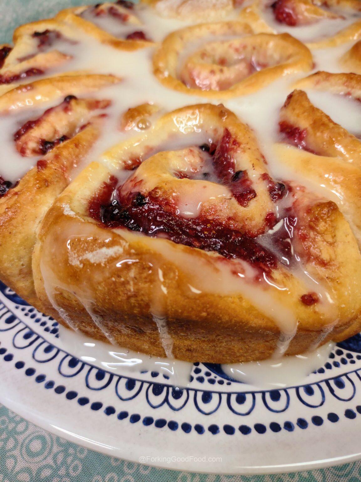 Cinnamon Rolls with Roasted Berries - Forking Good Food