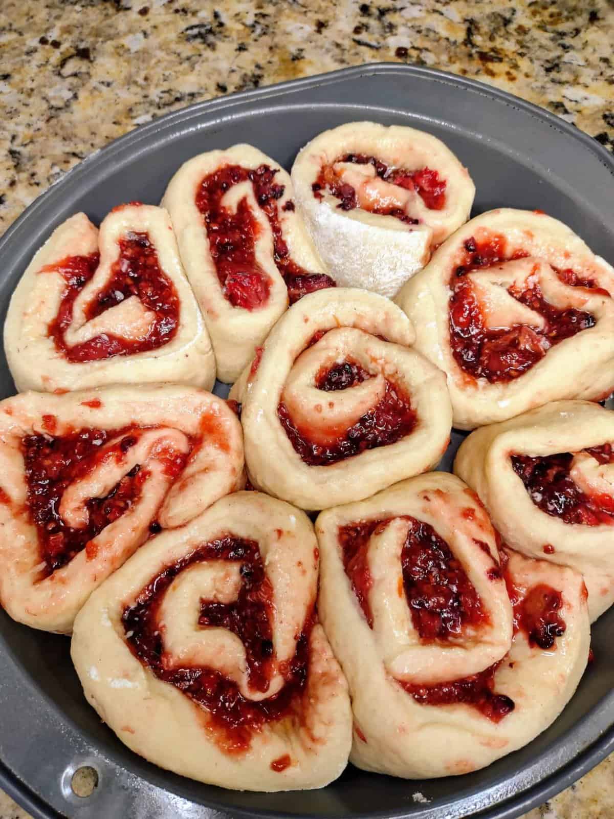 Cinnamon Rolls with Roasted Berries - Forking Good Food