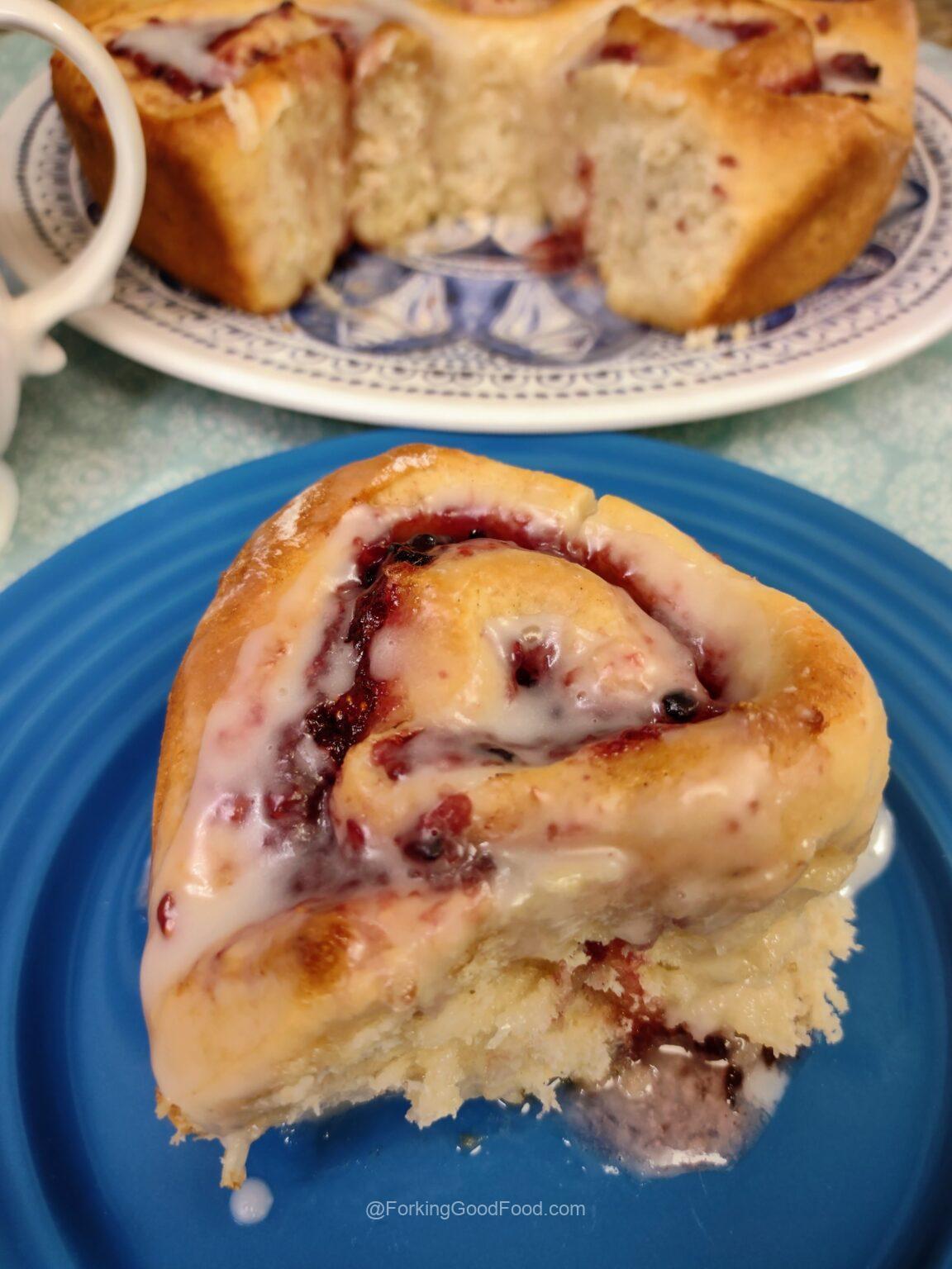 Cinnamon Rolls with Roasted Berries - Forking Good Food